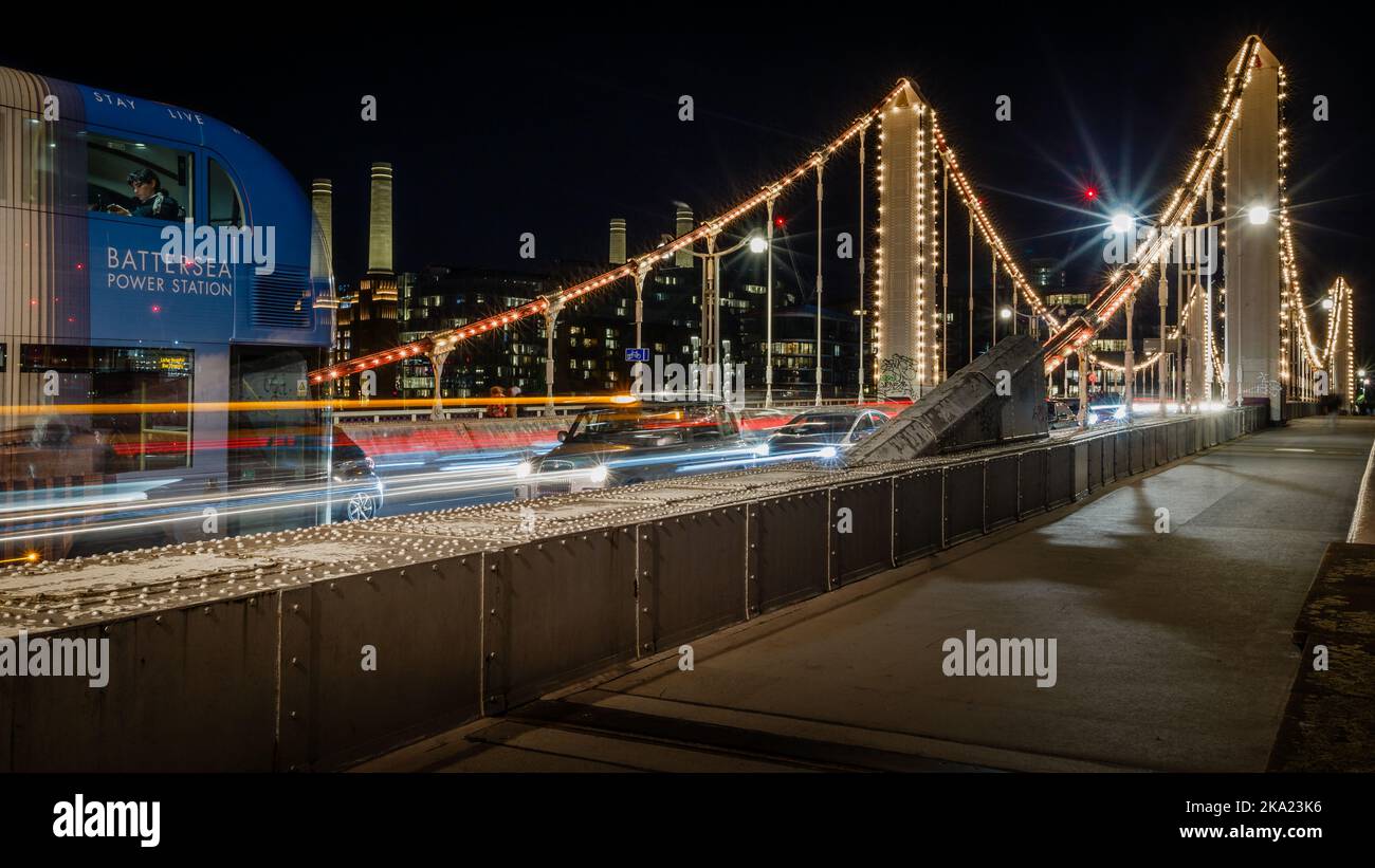 Traffic on Chelsea Bridge with Battersea Power Station on a bus, and ...