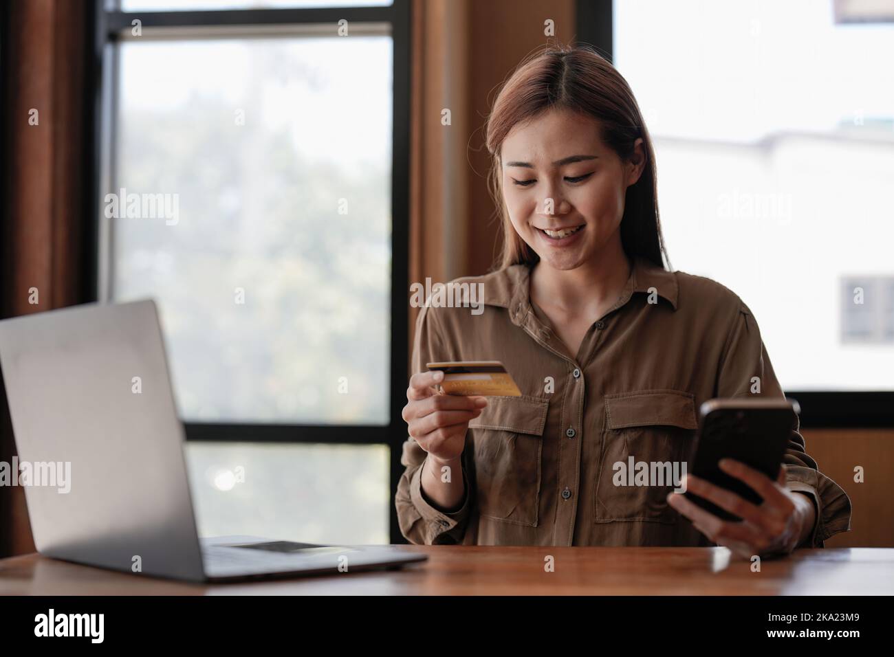 Asian woman credit card hi-res stock photography and images - Alamy