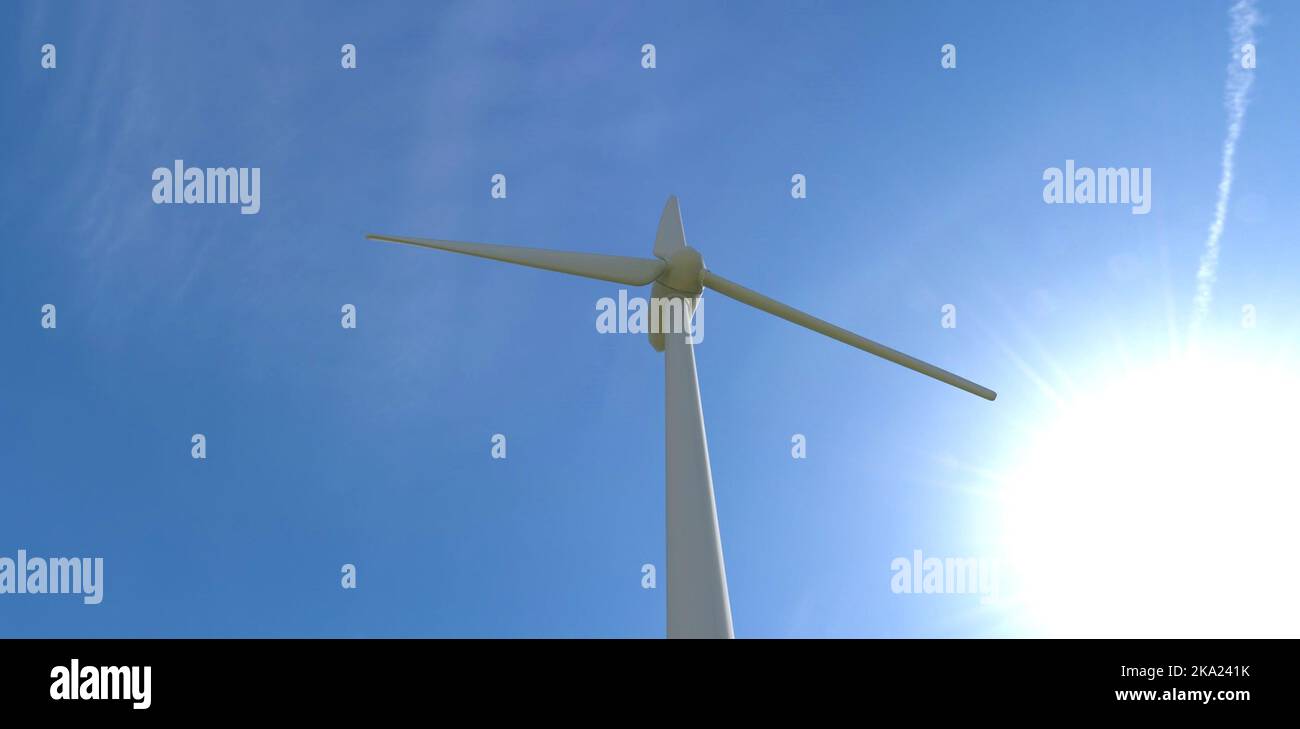 Bottom view of a white fan of an industrial wind turbine against the ...