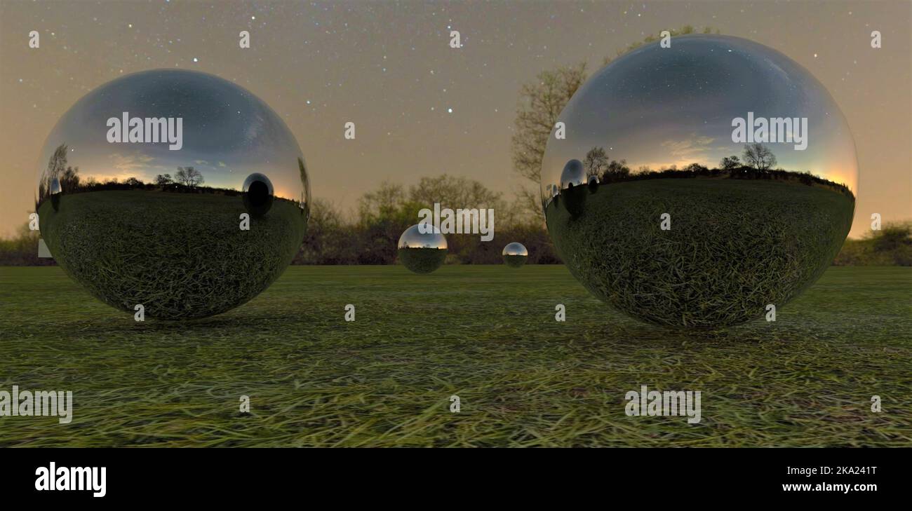 Giant metal balls that have fallen from the sky covered with chrome in ...