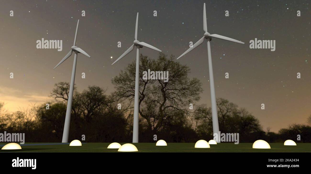 Three medium wind turbines against the background of the night sky ...