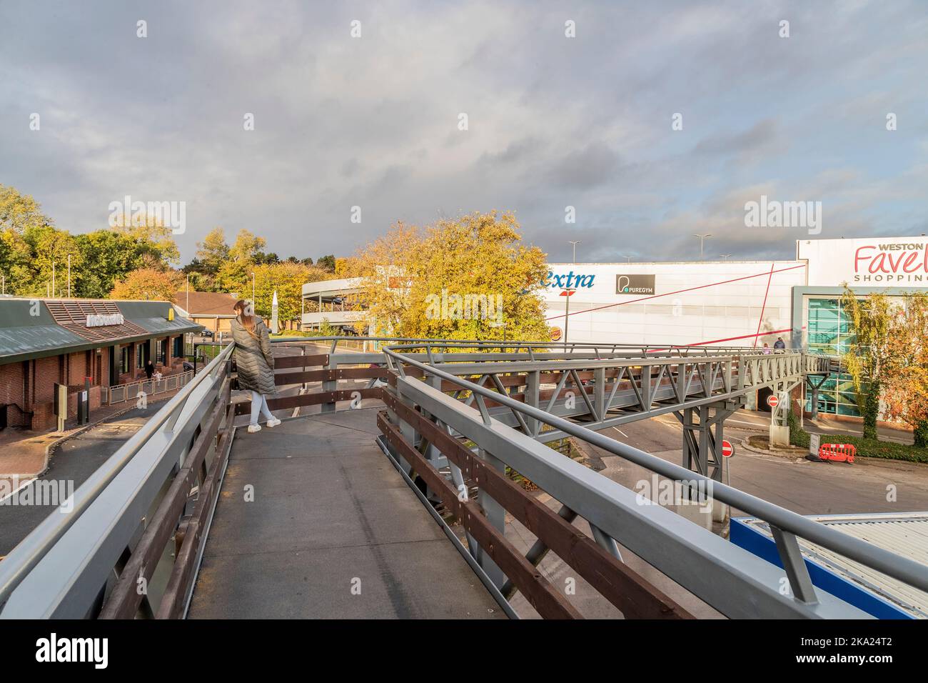 Metal overhead walkway leading to Western Favell shopping centre ...