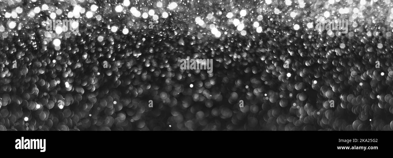 Gray black sparkling glitter bokeh background, abstract defocused ...