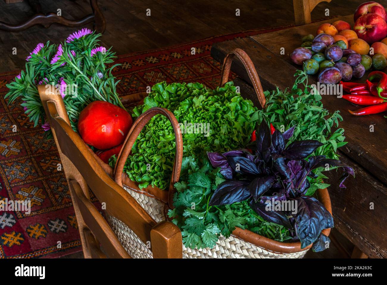 A still life view of fruit and vegetables, in the kitchen of a medieval ...