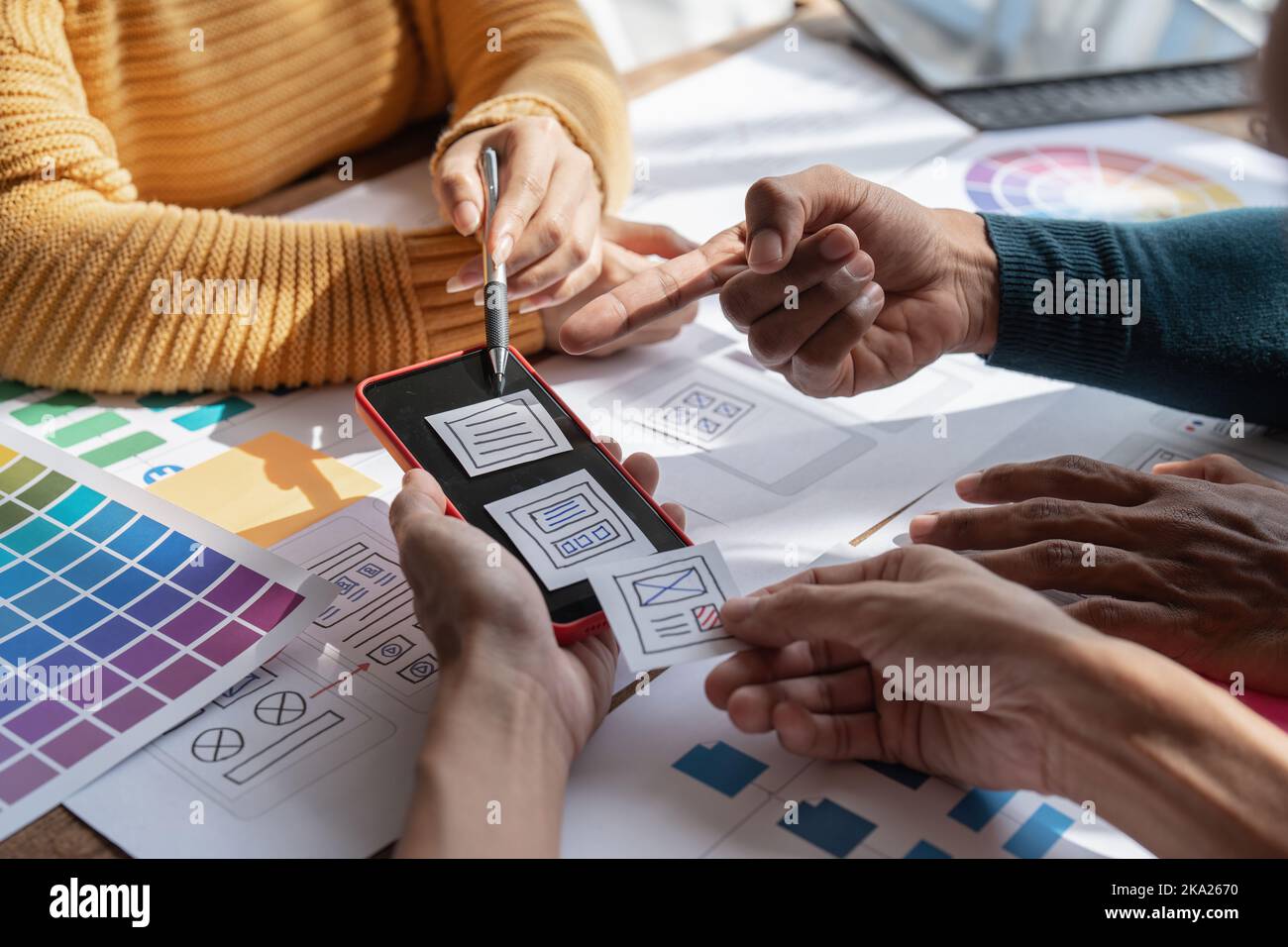 Group of ux developer and ui designer brainstorming about app interface ...