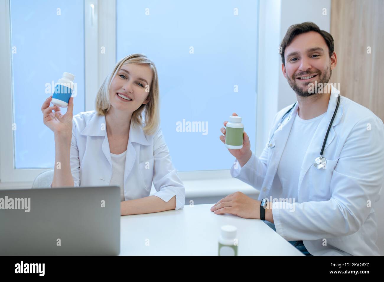 Vitamin prescription male doctor demonstrating hi-res stock photography ...