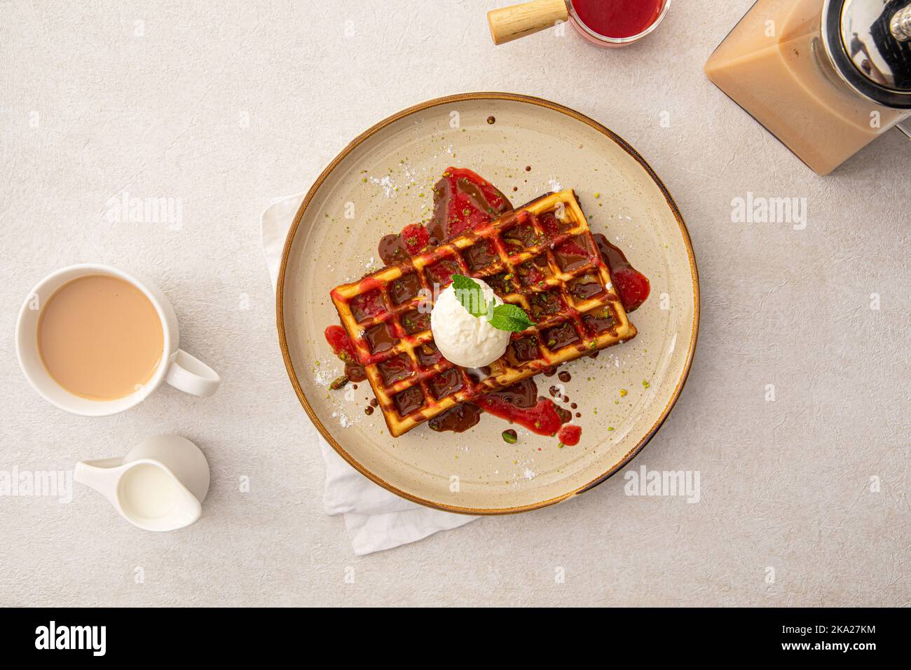 Portion of sweet belgian waffles with ice cream Stock Photo - Alamy