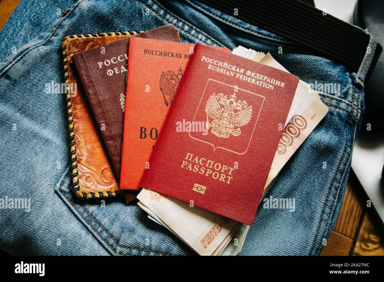 Russian documents and cash money are lying on a stick of things, the ...