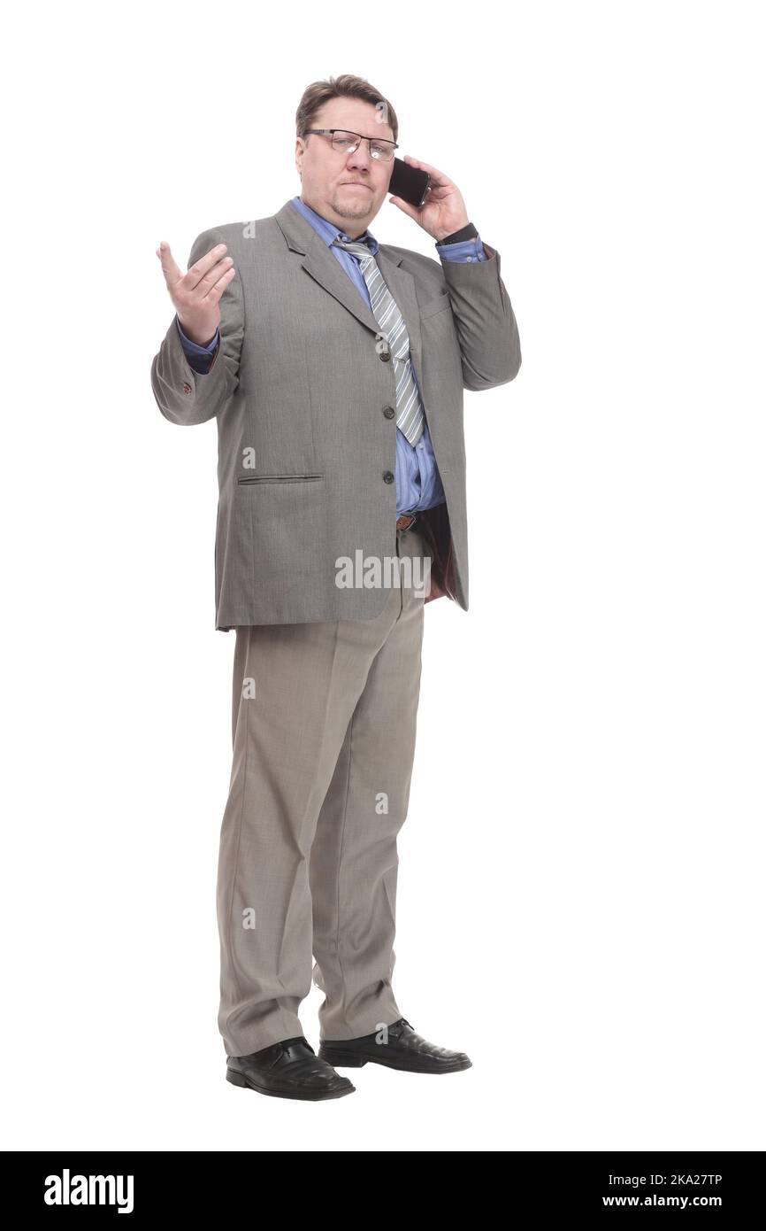 in full growth. serious business man with a smartphone Stock Photo - Alamy