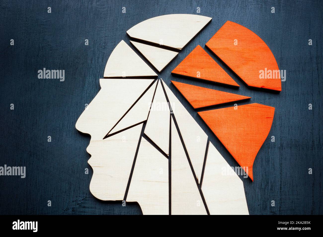 Broken head shape as a symbol of headache Stock Photo - Alamy