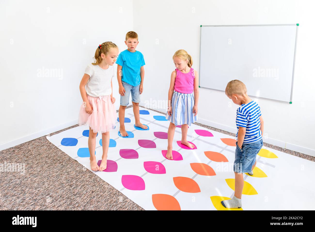 Child occupational therapy session. Group of children doing playful ...