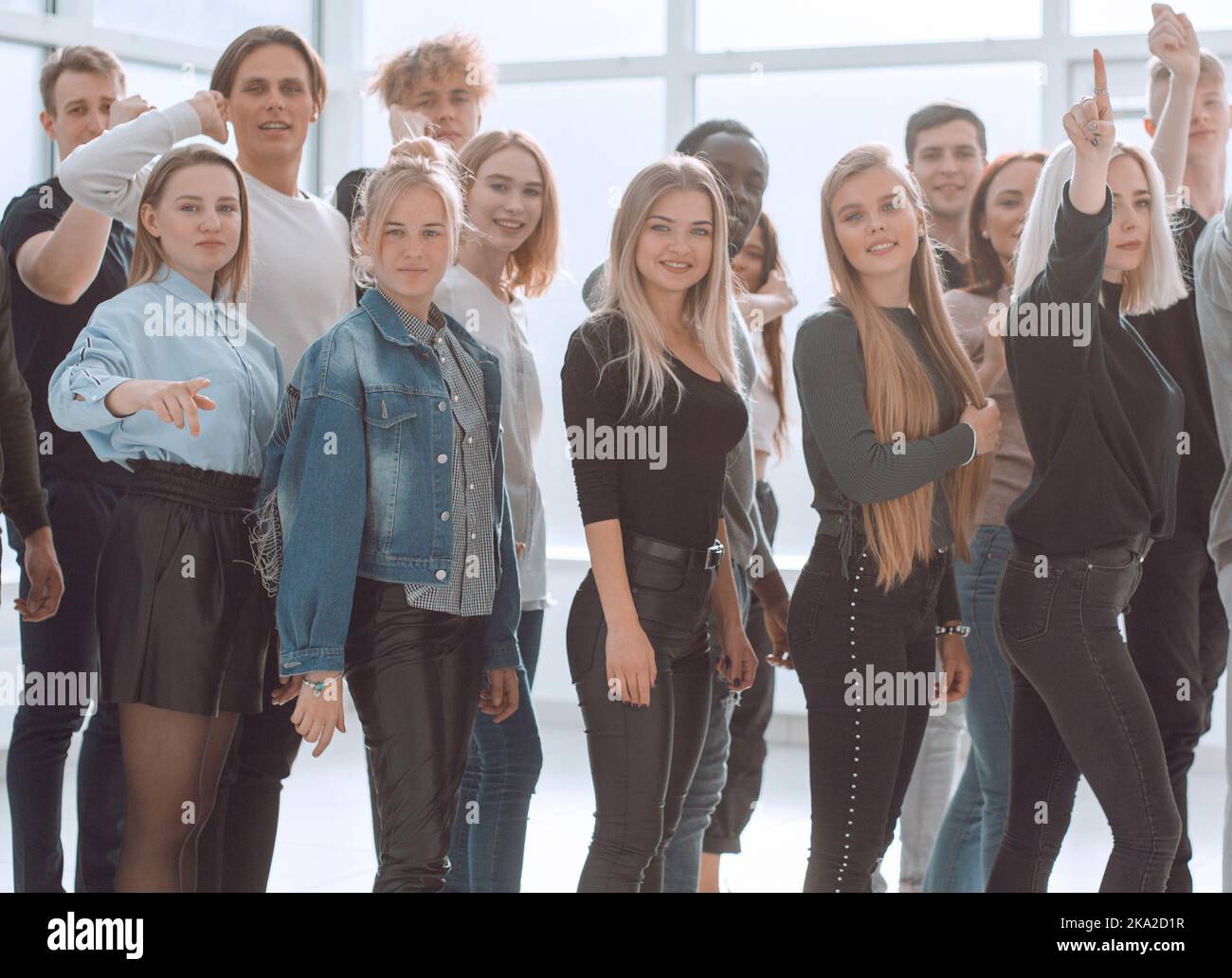 group of young business people pointing up Stock Photo - Alamy