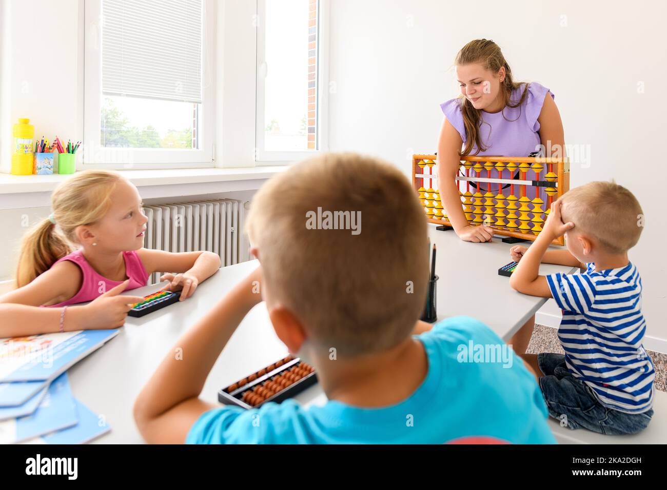 Child occupational therapy session. Group of children doing playful ...