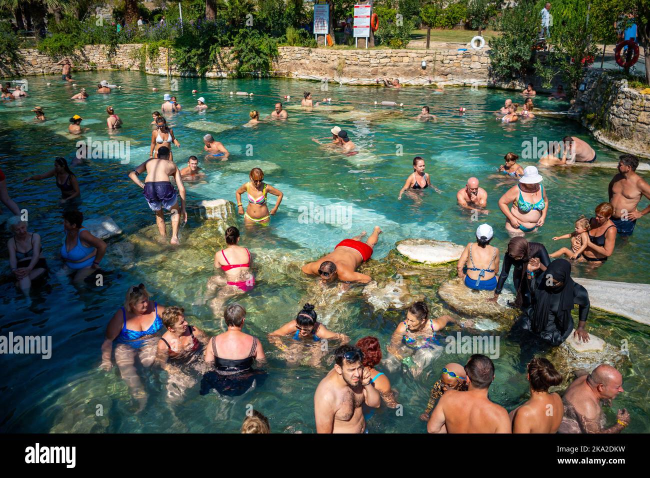 Pamukale, Turkey - September 14, 2022: Tourists enjoying the Antique ...