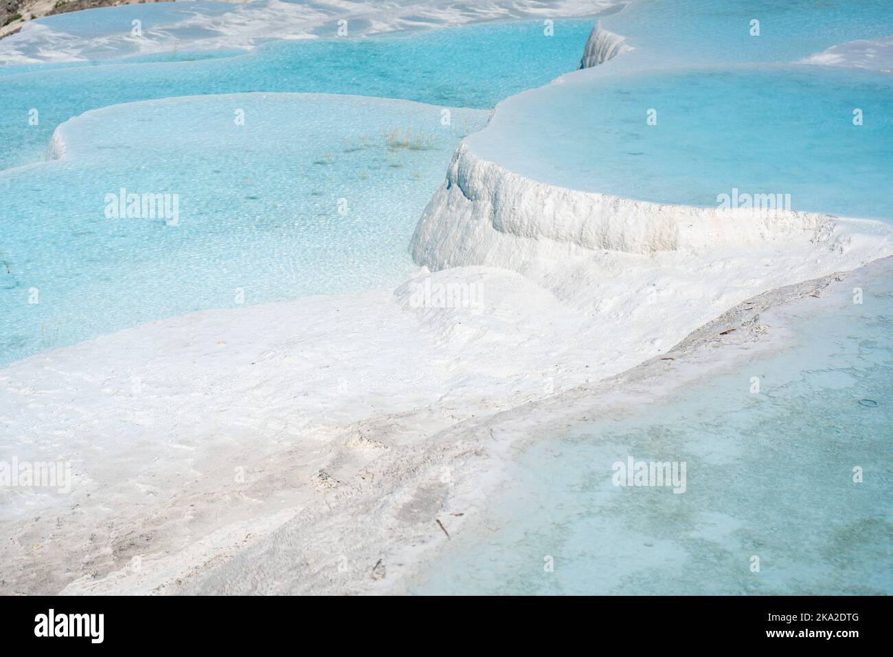 White travertines, calcite cliff of Pamukkale in Turkey Stock Photo - Alamy