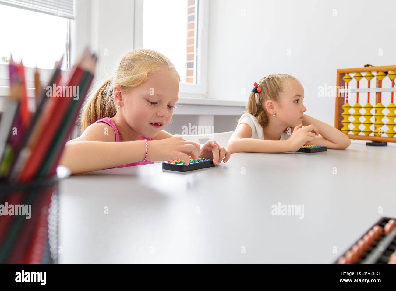 Children with learning difficulty in occupational therapy. Girls doing ...