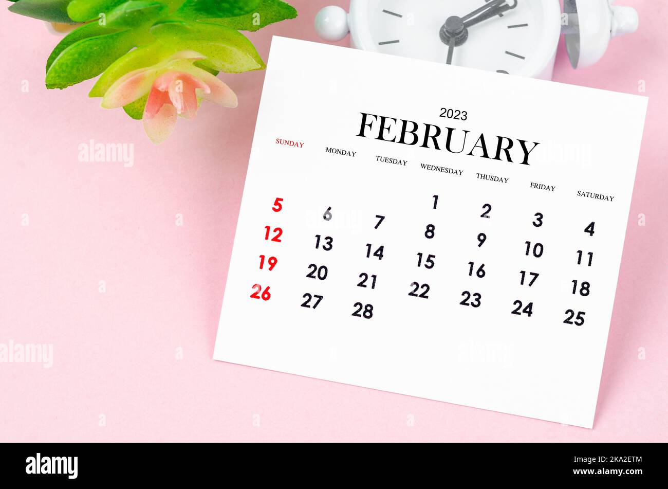 February 2023 Monthly calendar for 2023 year with vintage alarm clock ...
