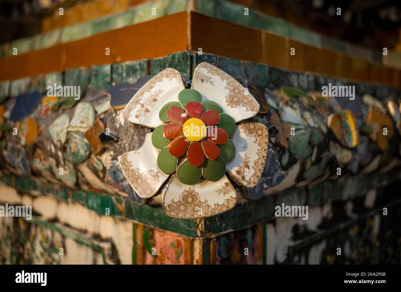 Decoration in the shape of flowers made from broken plates on Wat Arun ...