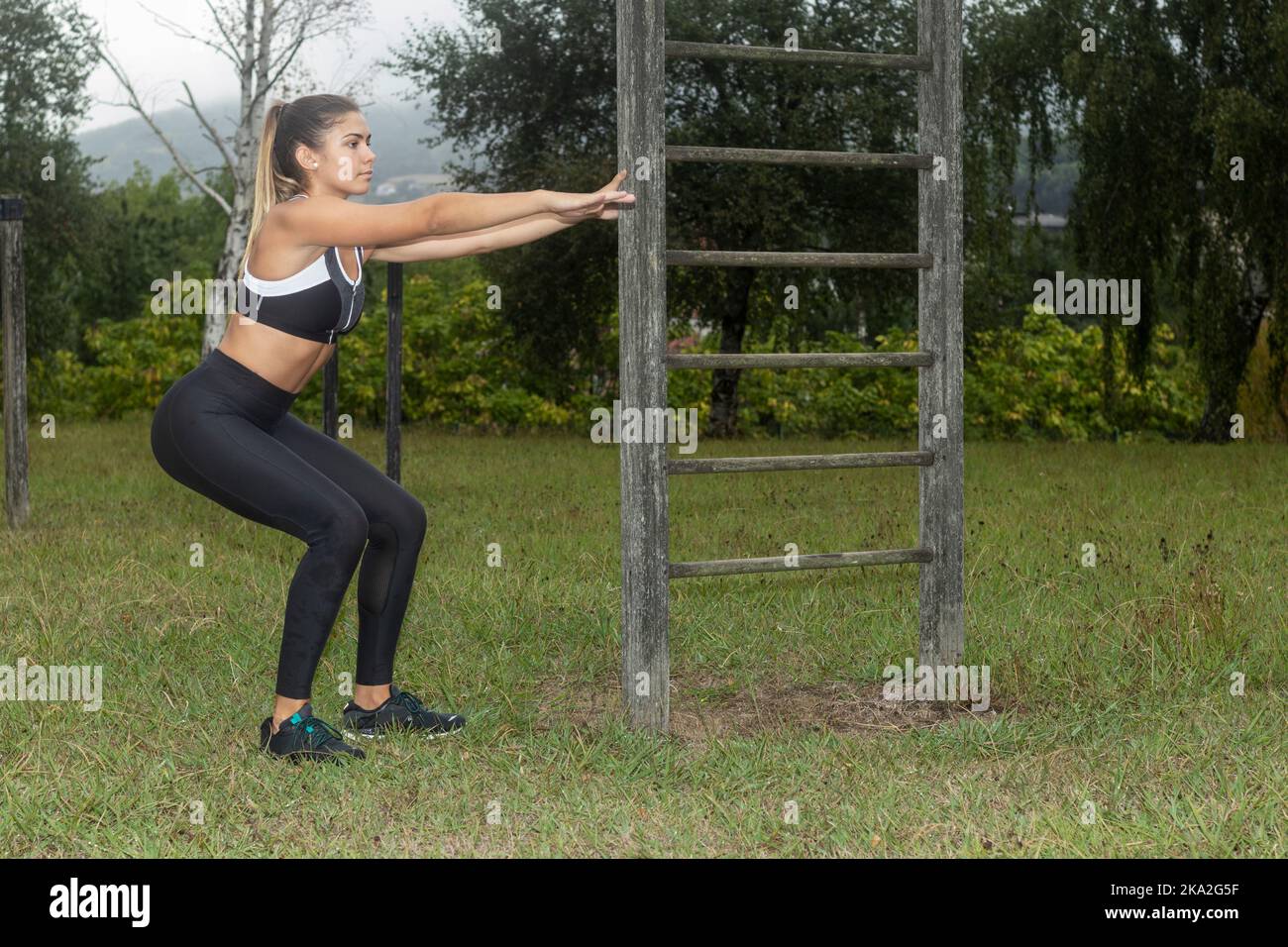 beautiful woman working out in the summer park Stock Photo - Alamy