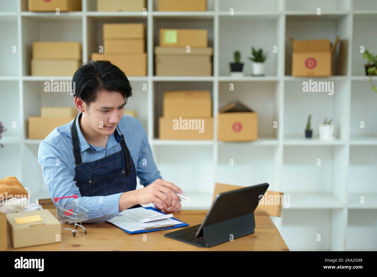 Picture of a small start-up and SME owner, an Asian male entrepreneur ... Picture of a small start-up and SME owner, an Asian male entrepreneur ...