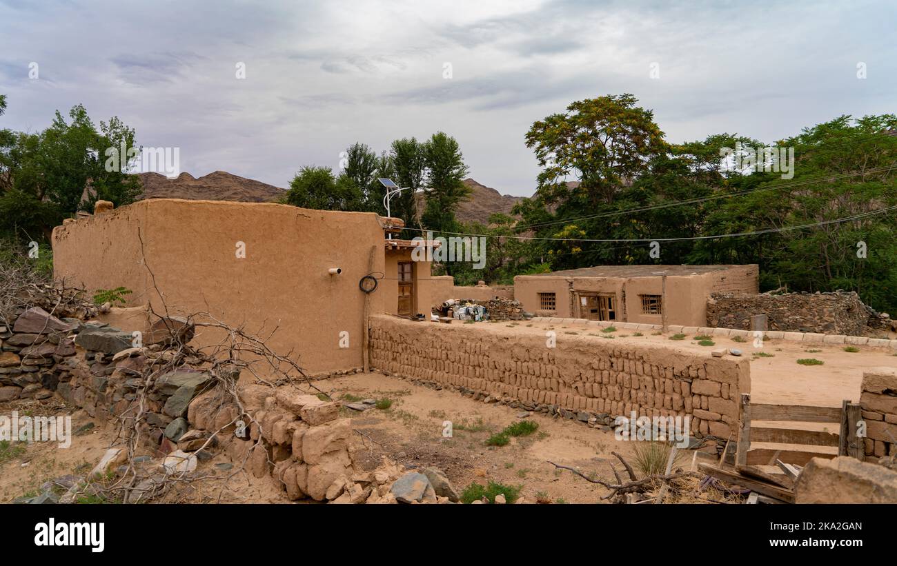An old mud brick house walls captured in a village with poor living ...