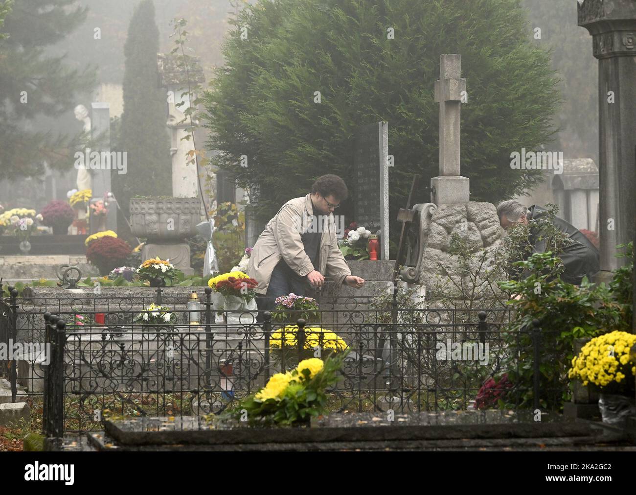 Zagreb, Croatia. 31st Oct, 2022. People visit the graves of their loved ...
