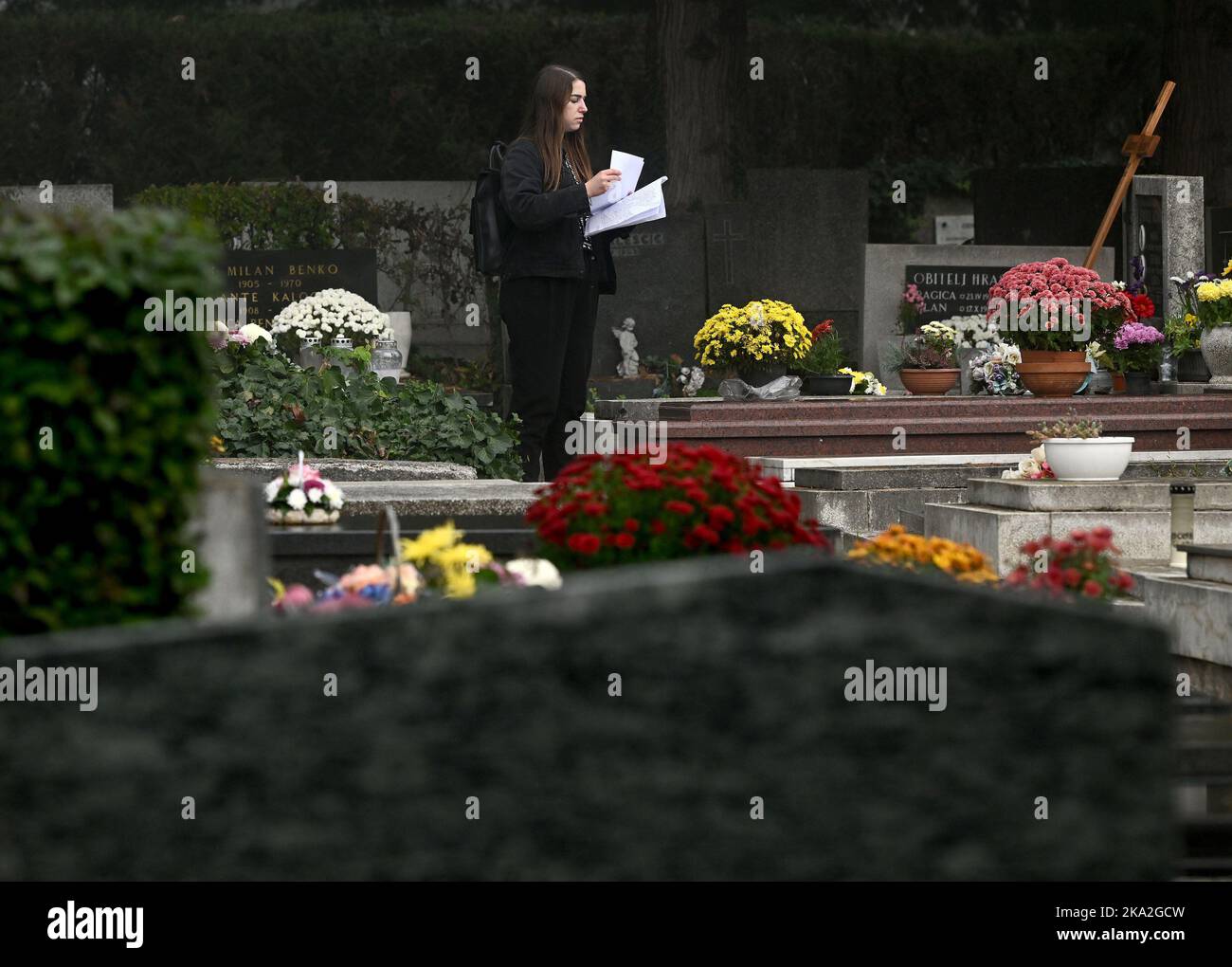 Zagreb, Croatia. 31st Oct, 2022. People visit the graves of their loved ...