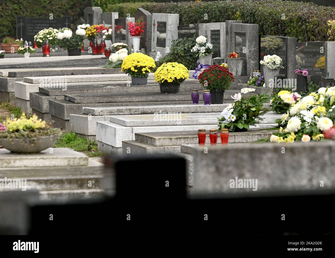 Zagreb, Croatia. 31st Oct, 2022. People visit the graves of their loved ...