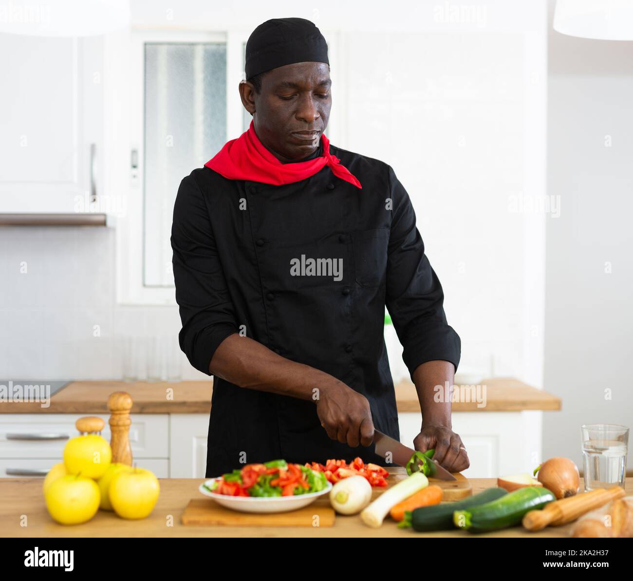 Black man male cook hi-res stock photography and images - Alamy