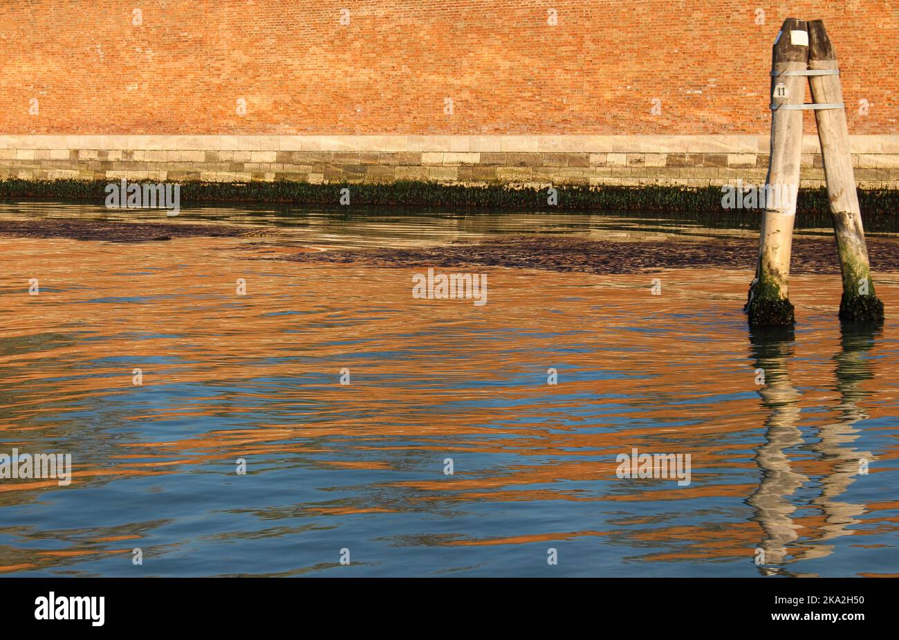 Two docks tied together in a lake Stock Photo - Alamy