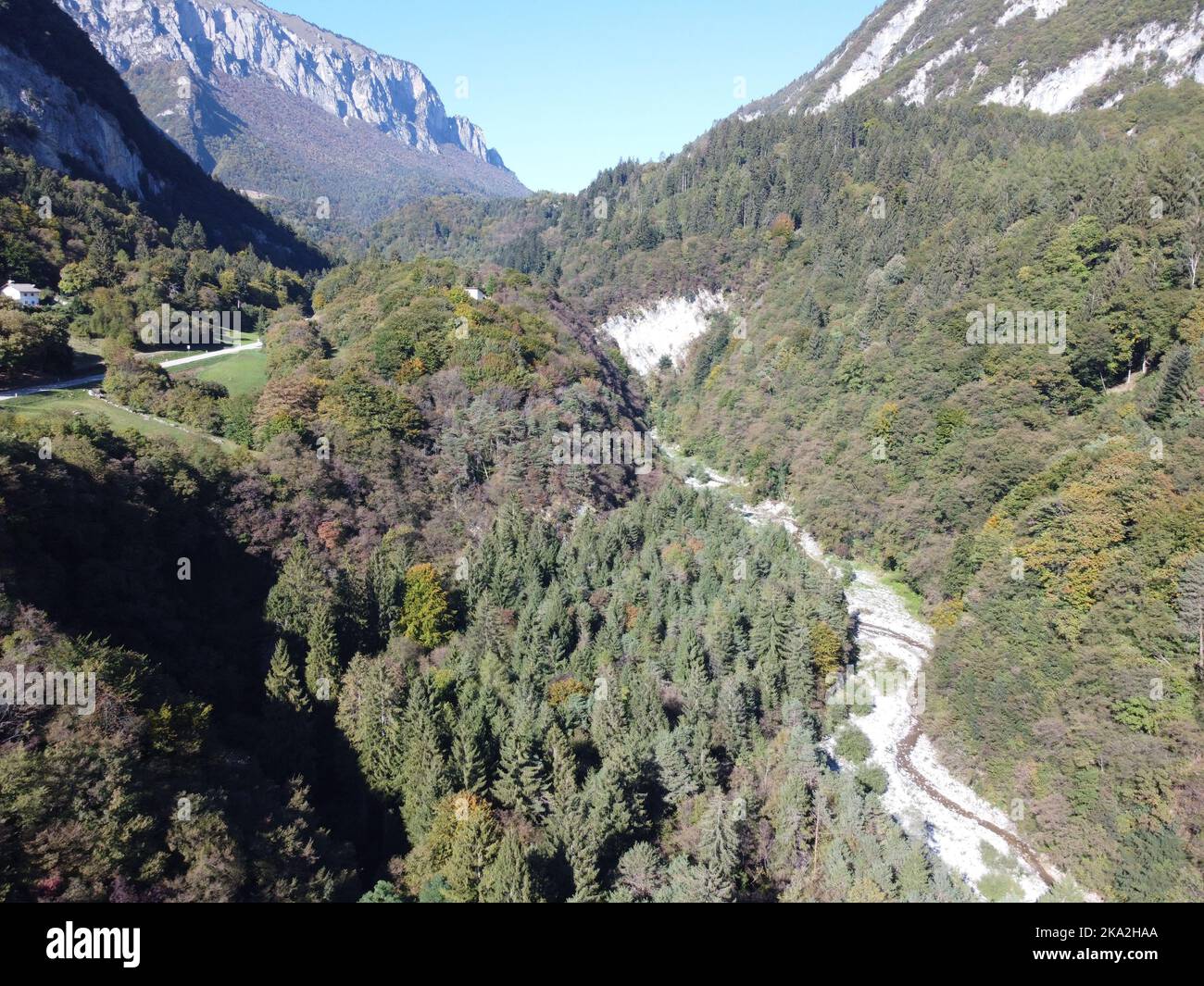 An aerial view of a road on a forested mountain slope Stock Photo - Alamy