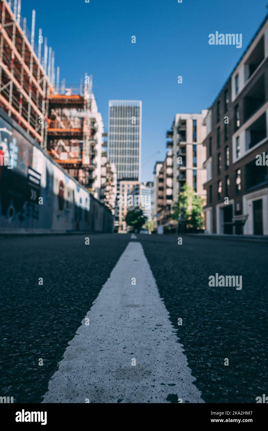 An empty street with modern houses in Stratford Stock Photo - Alamy