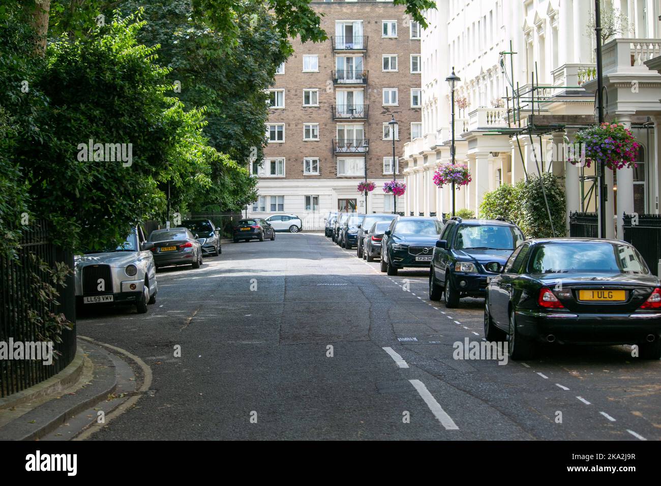 The cars parked on a side street near Hyde Park, London, UK Stock Photo ...