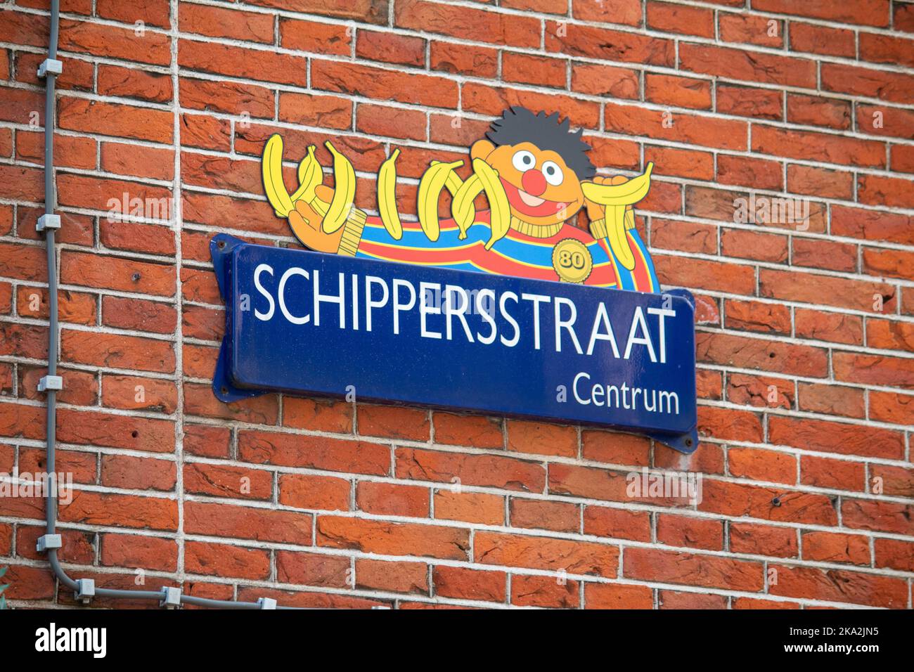 The funny street sign with Ernie from Sesame Street in Amsterdam, close ...