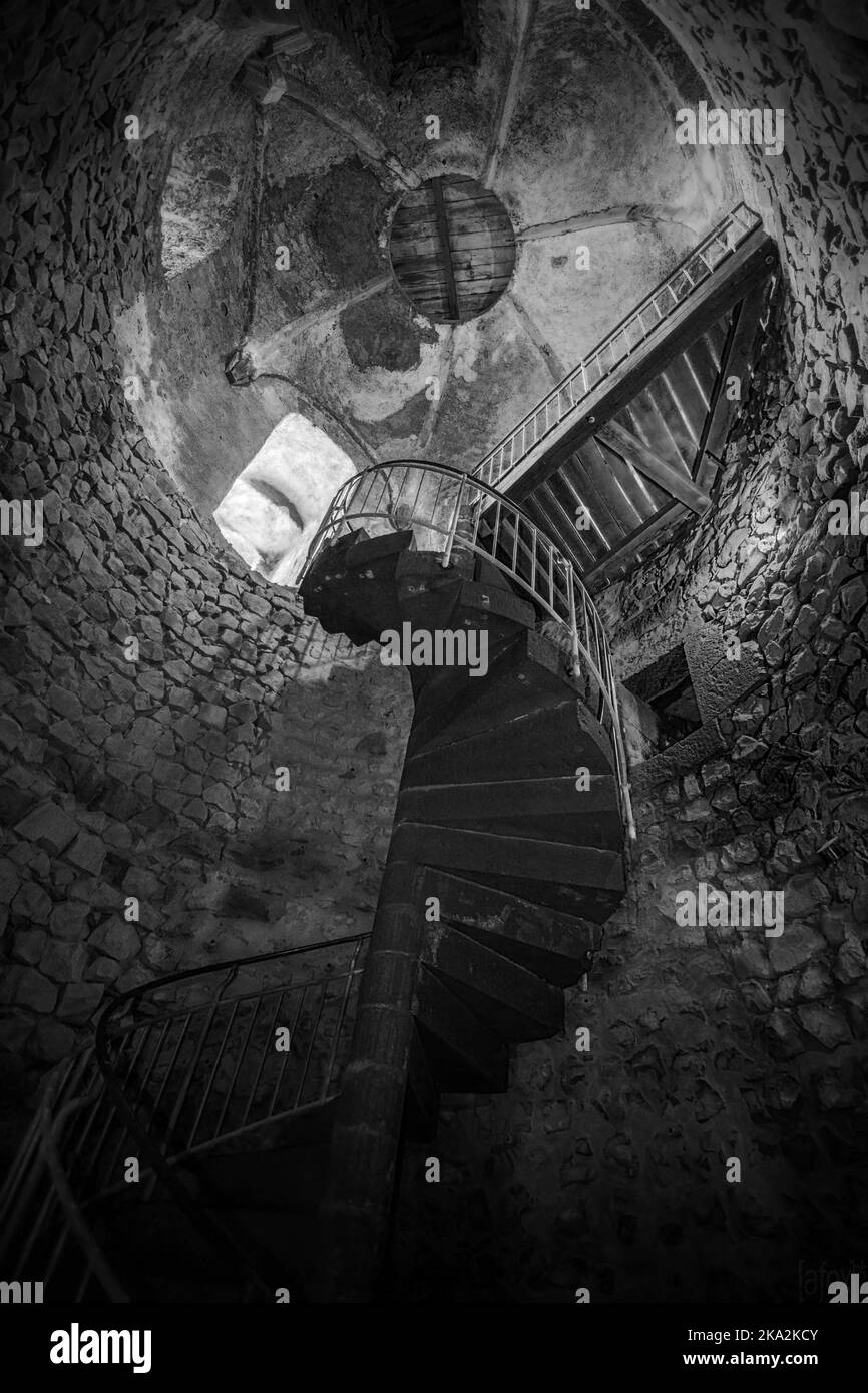 A low-angle shot of the inside of an ancient castle with a rotating ...