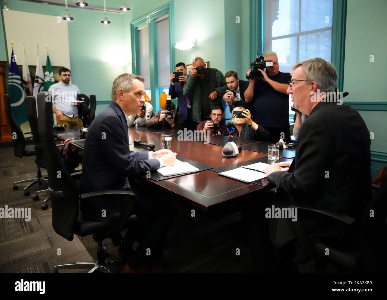Outgoing Ottawa mayor Jim Watson (right) welcomes mayor-elect Mark ...