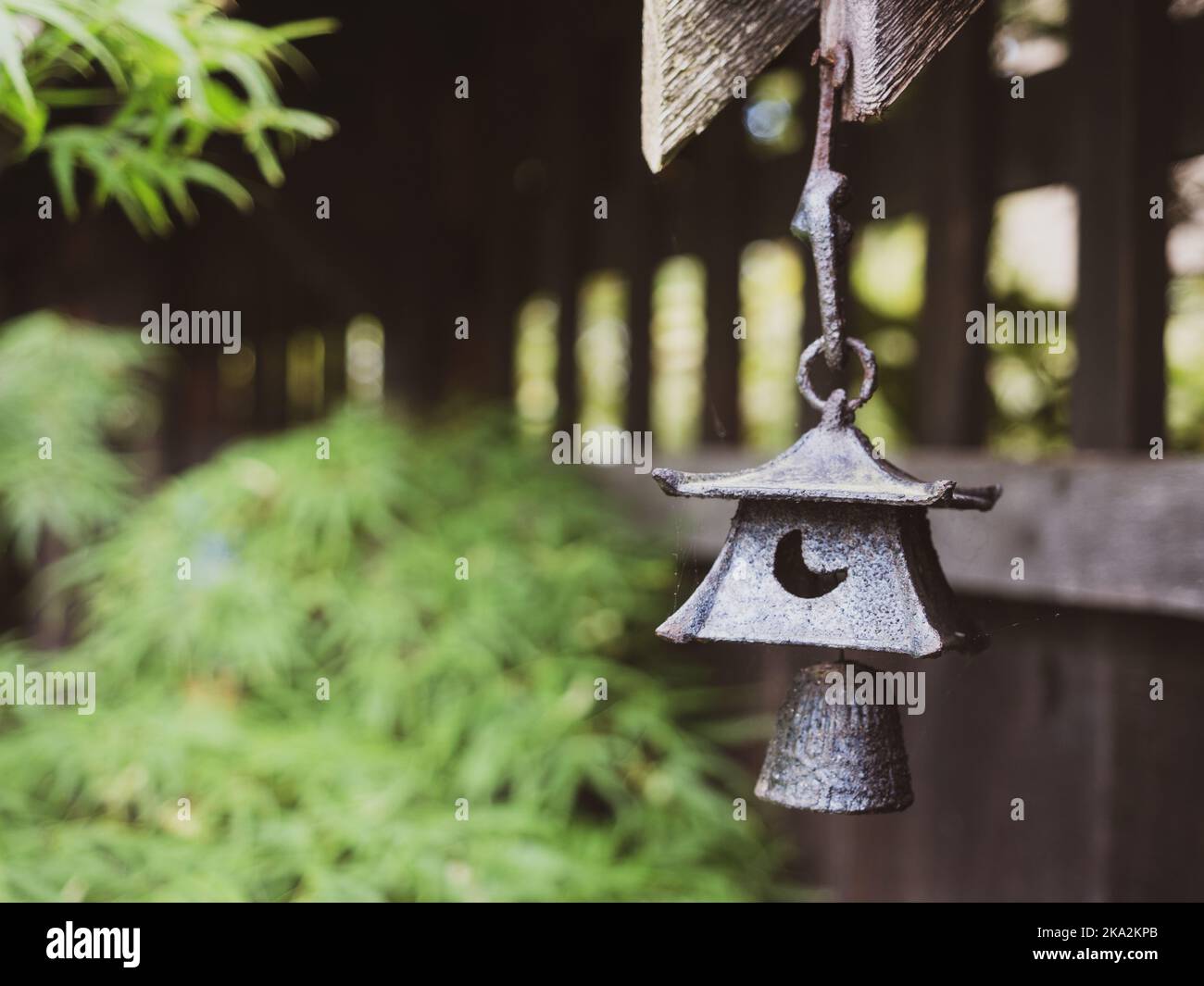 A closeup shot of a Japanese bell furin hanging from the roof Stock ...