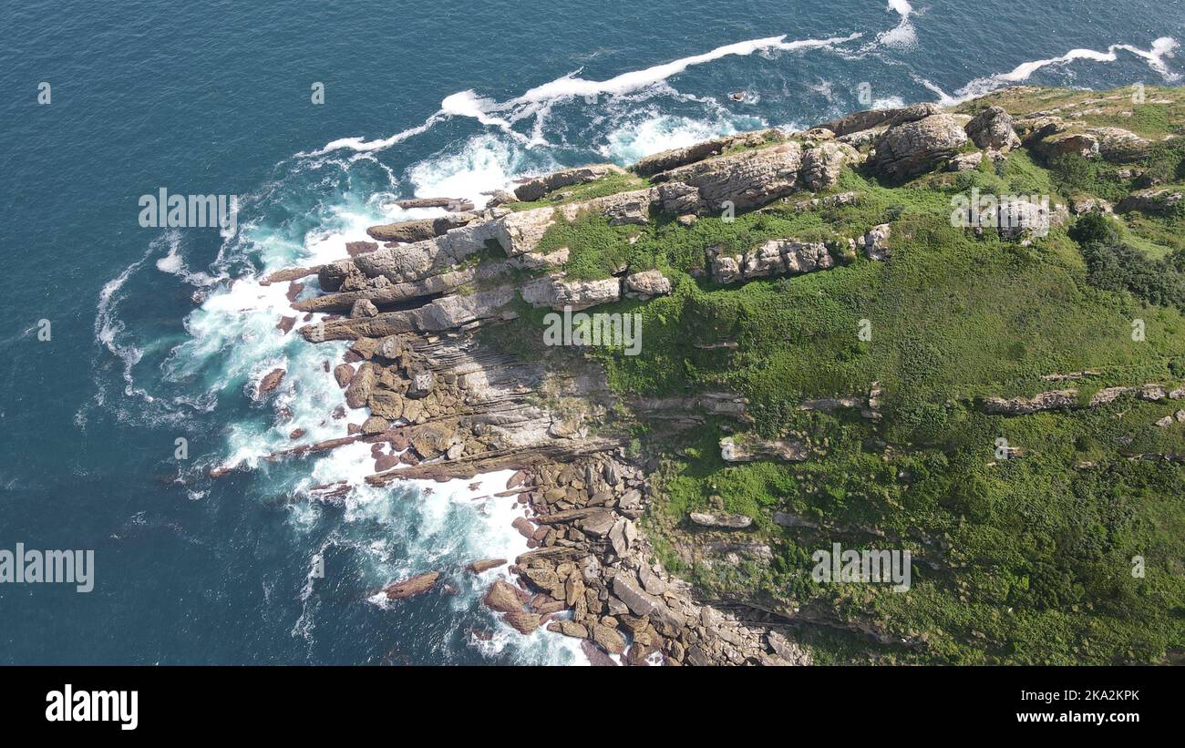 An aerial view of the rough cliff coast in San Sebastian, Spain Stock ...