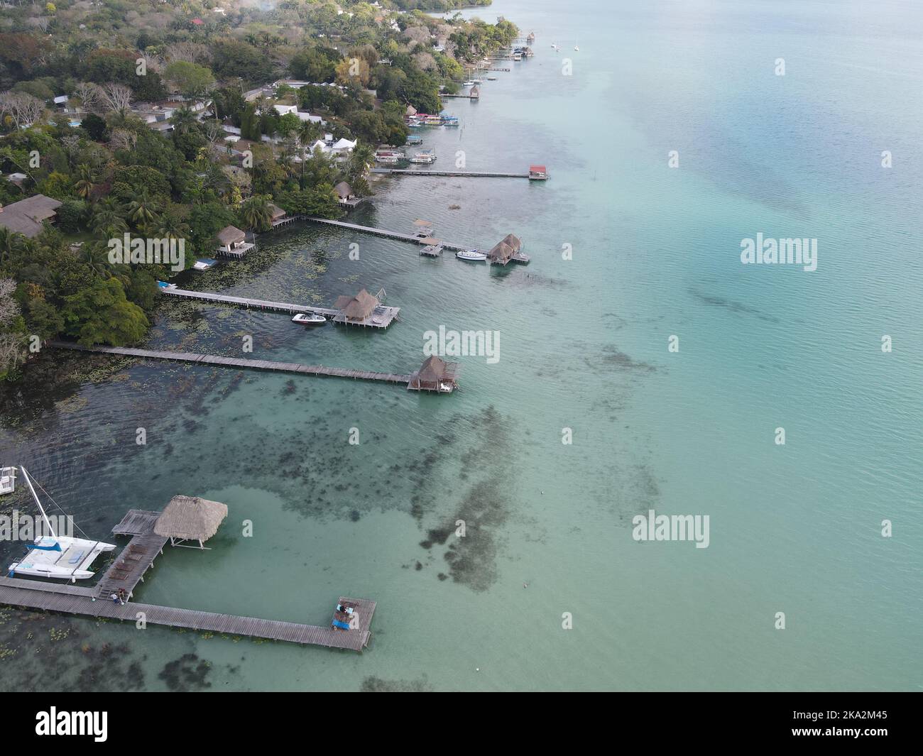 An aerial view of piers at the colorful Lagoon in Bacalar, Mexico Stock ...