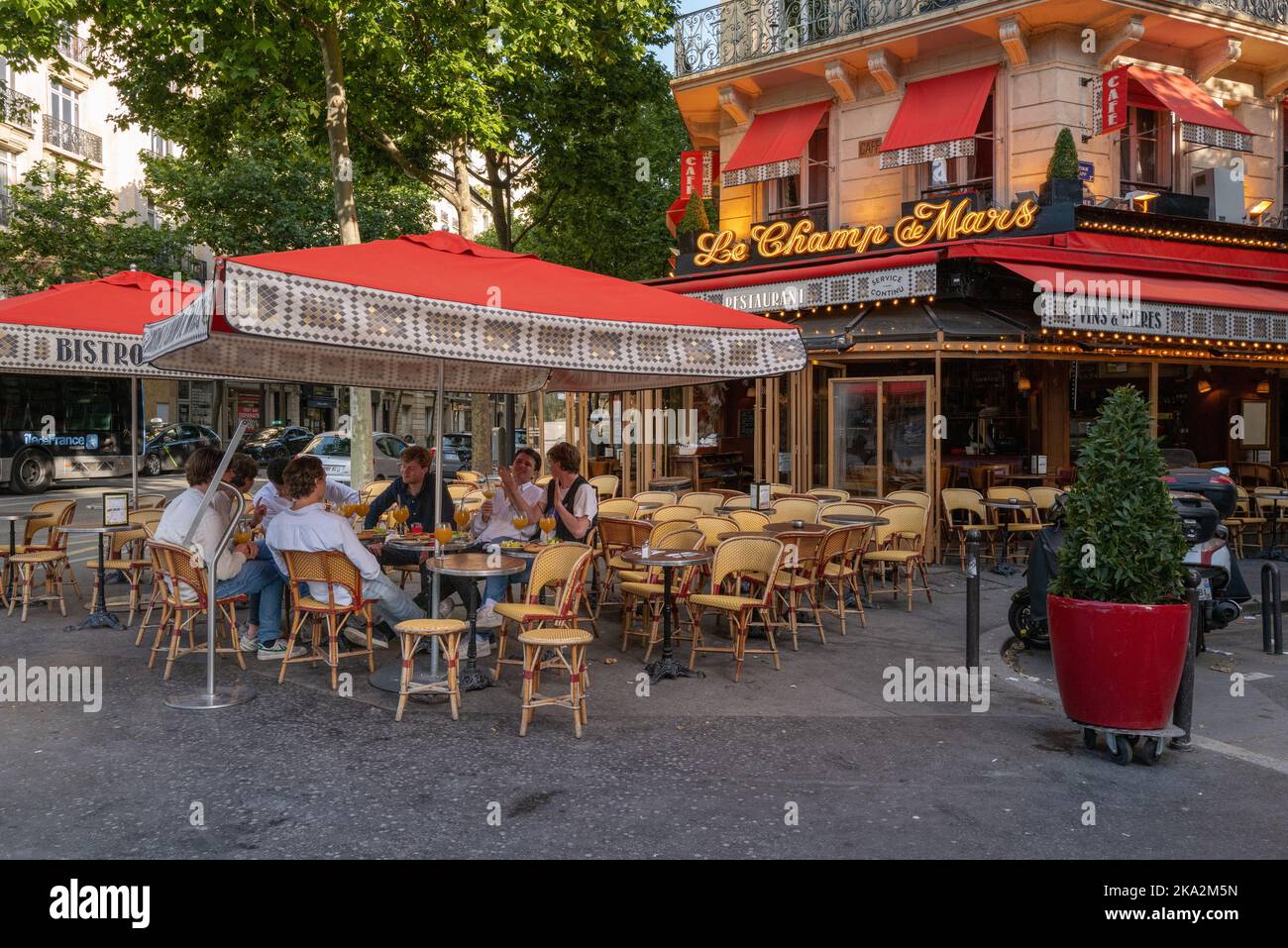 An aerial view of sidewalk cafe with table and chairs in Paris Stock ...