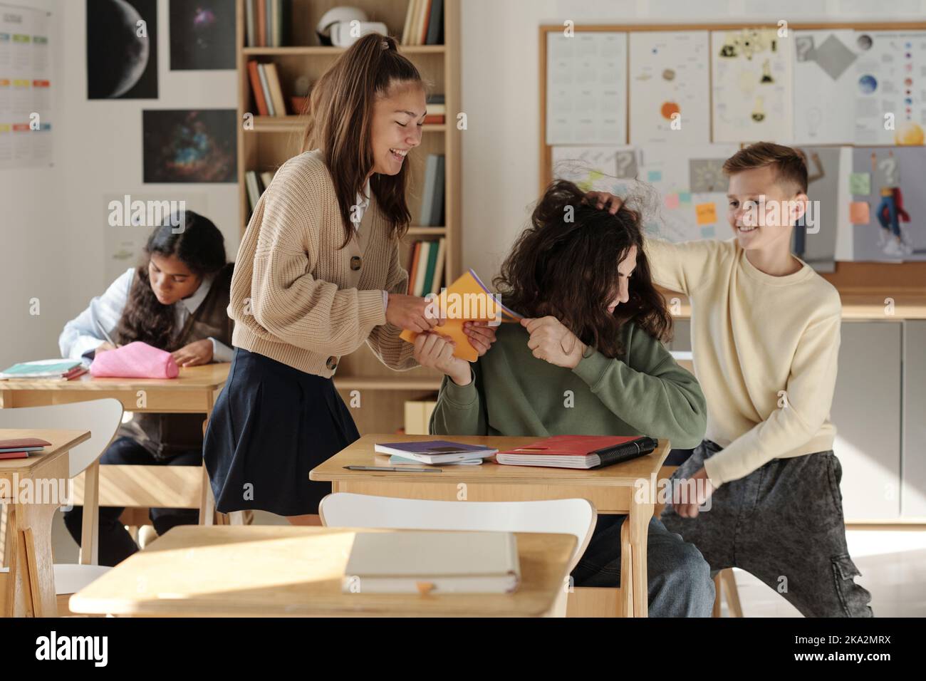 African american schoolboy taking notes hi-res stock photography and ...