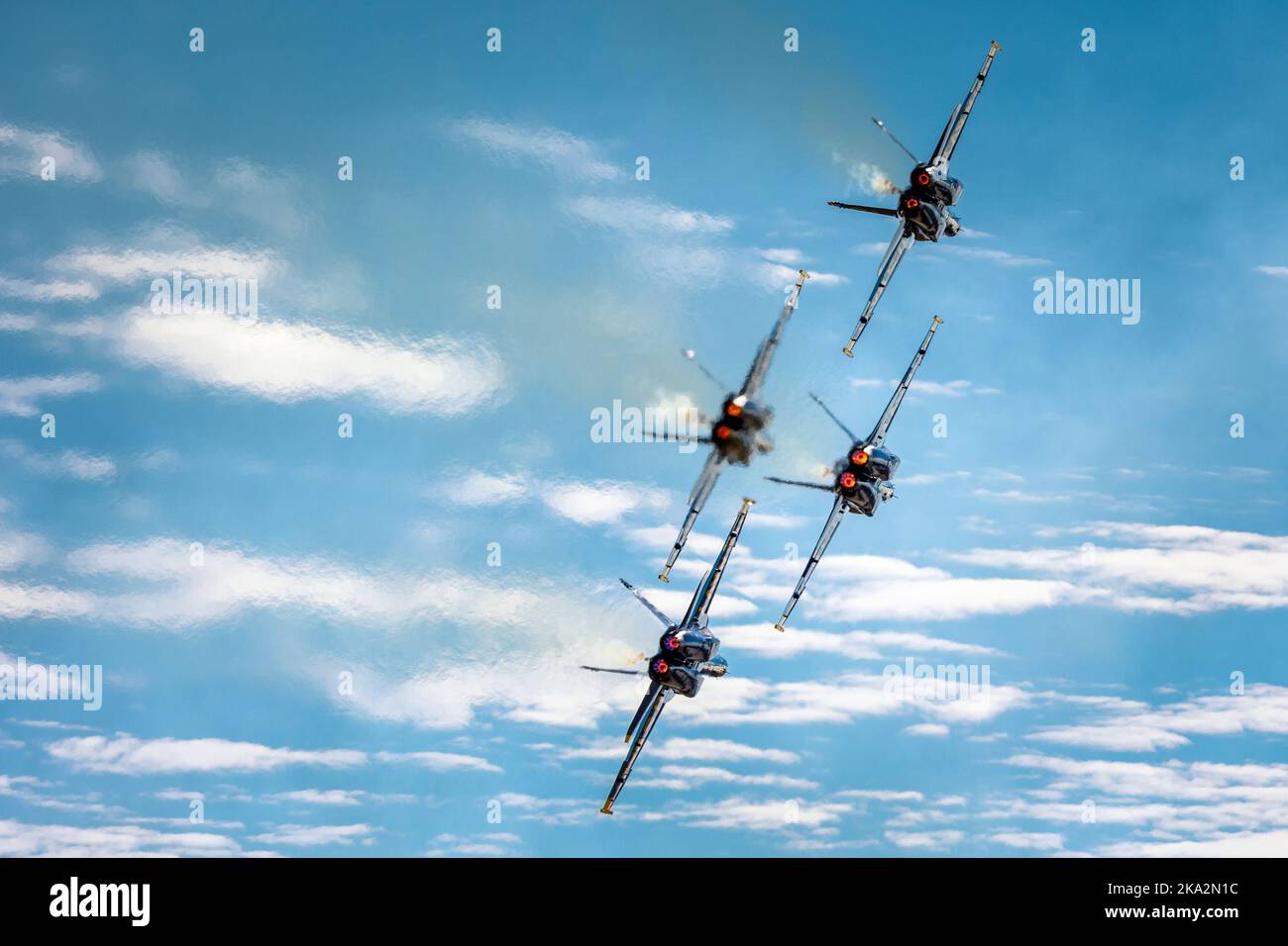 The US Navy Blue Angels, in their diamond formation, in a tight turn at ...