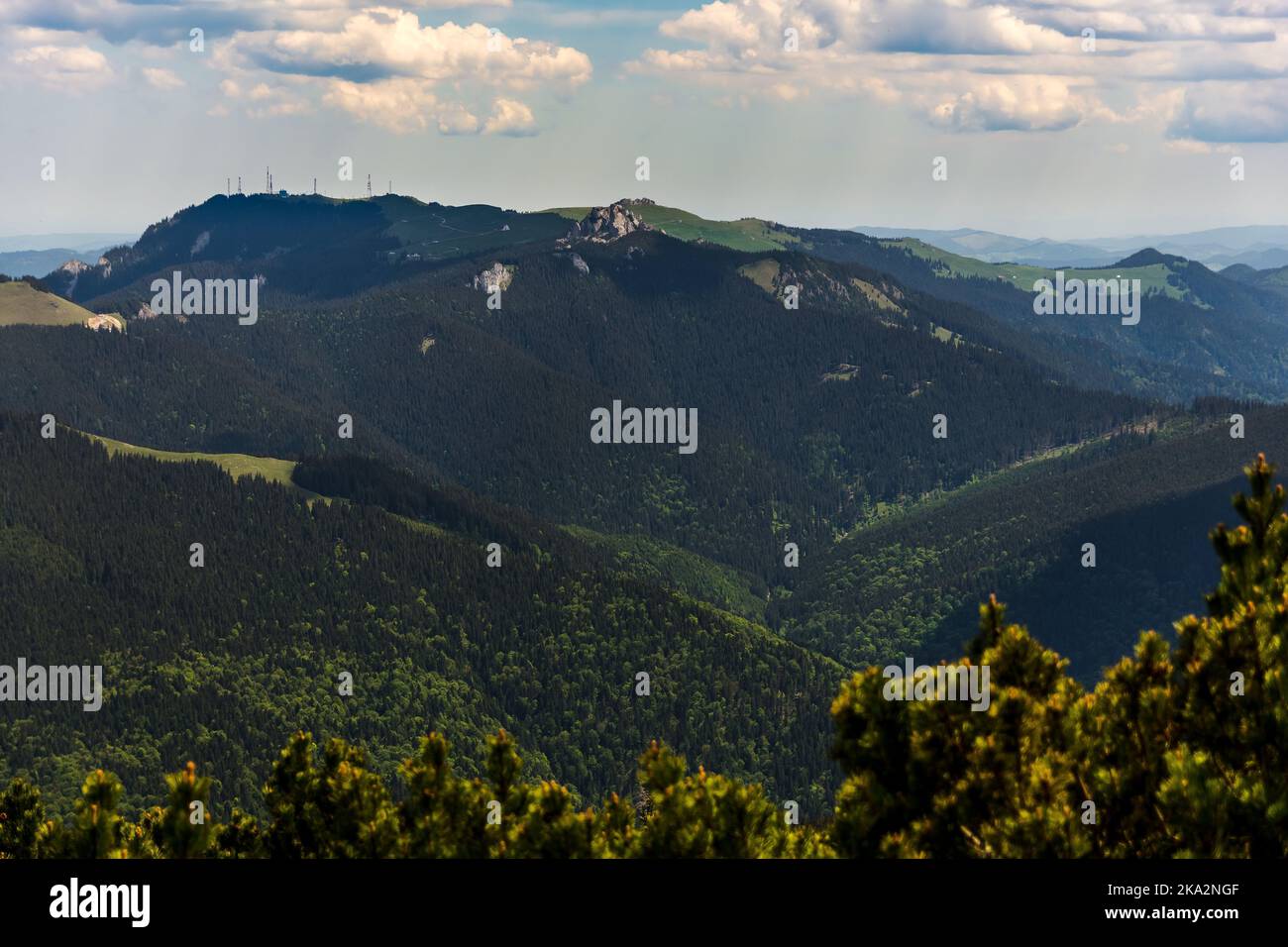 Beautiful scenery of green valley in Rarau Mountains under cloudy sky ...
