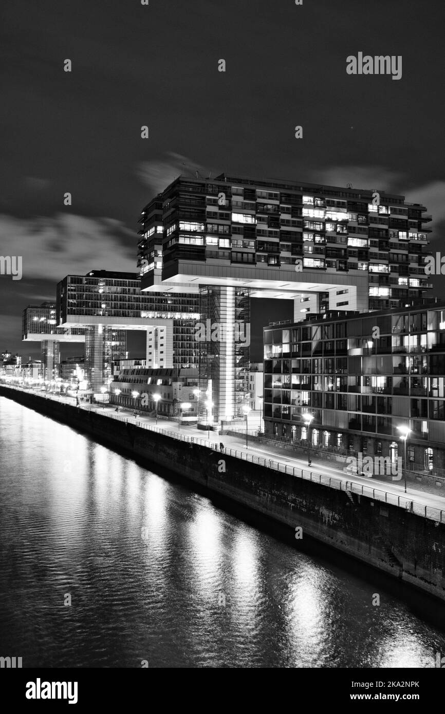 An aerial view of illuminated crane houses by the canal at the ...