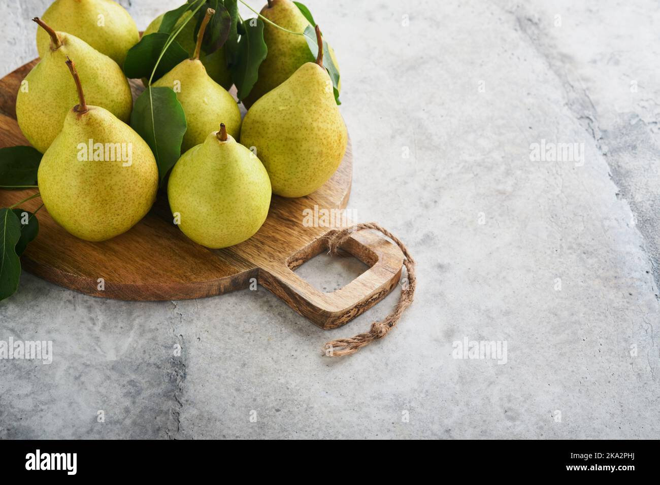 Pears. Fresh sweet organic pears with leaves on stand or plate on old ...