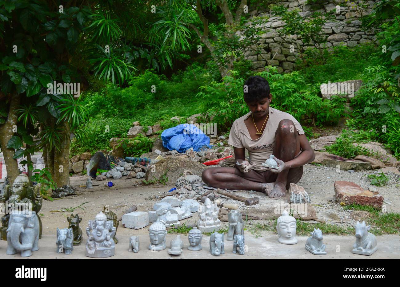 An Indian male making some traditional ceramic idol statues Stock Photo ...