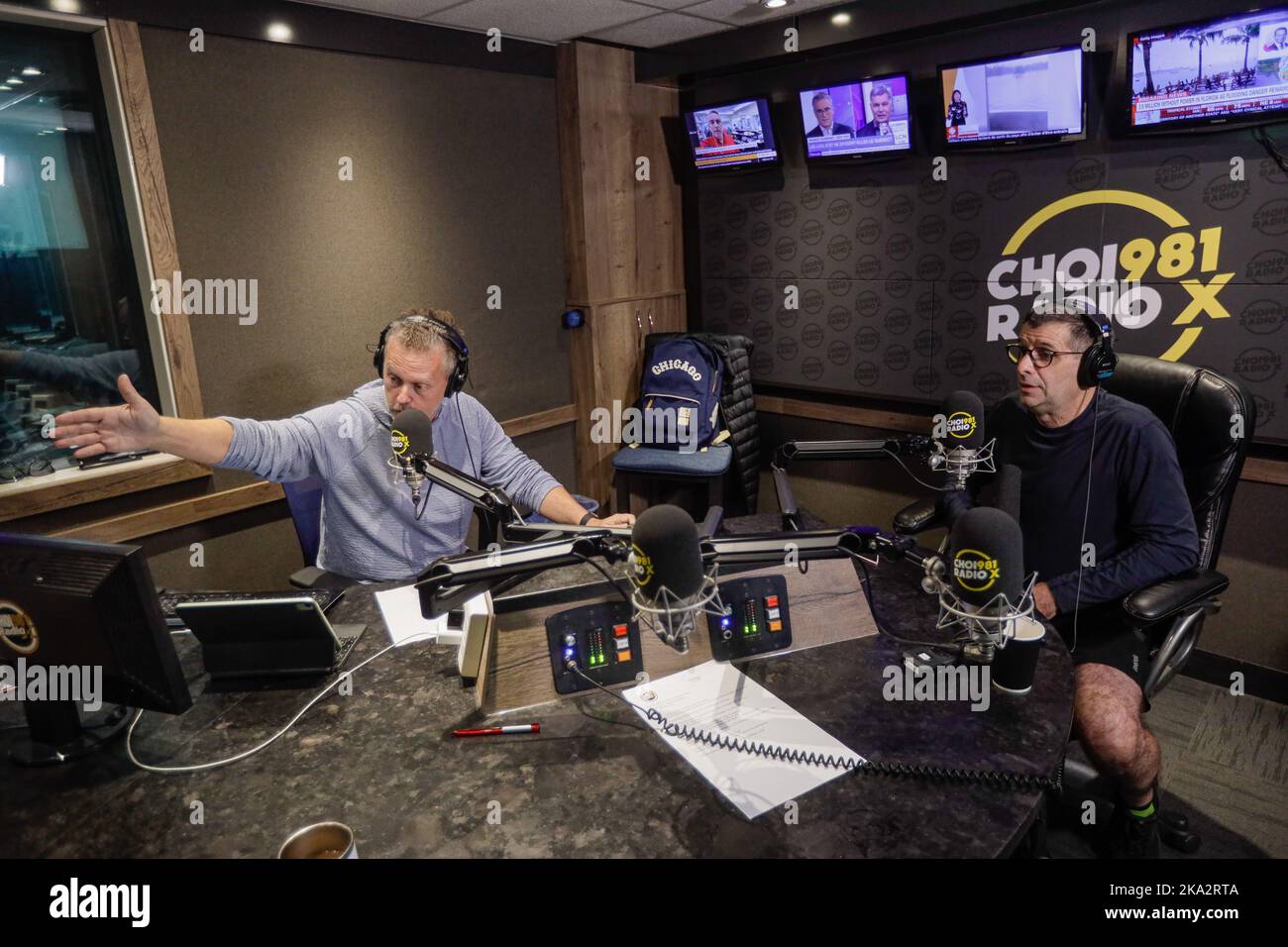 Morning man radio host Dominic Maurais (left) talks to PCQ leader Eric ...