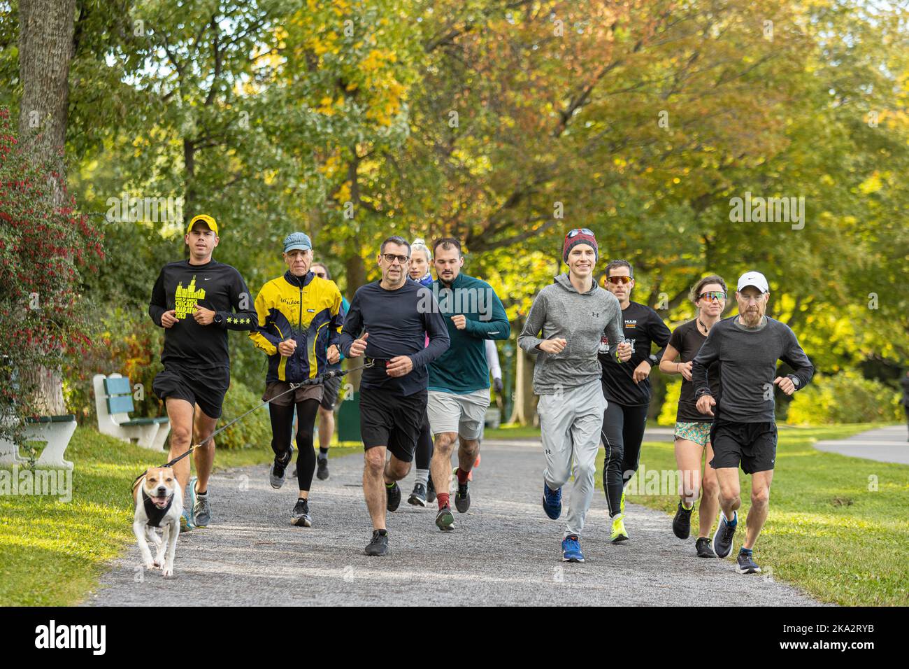 PCQ leader Eric Duhaime runs with his dog Mia and supporters and ...