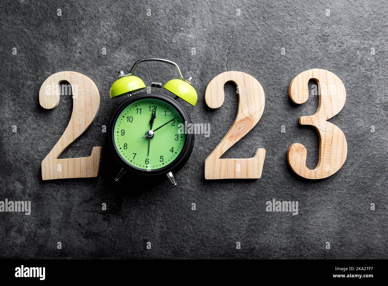 2023 with a clock with a black background. Happy New Year 2023 Stock ...