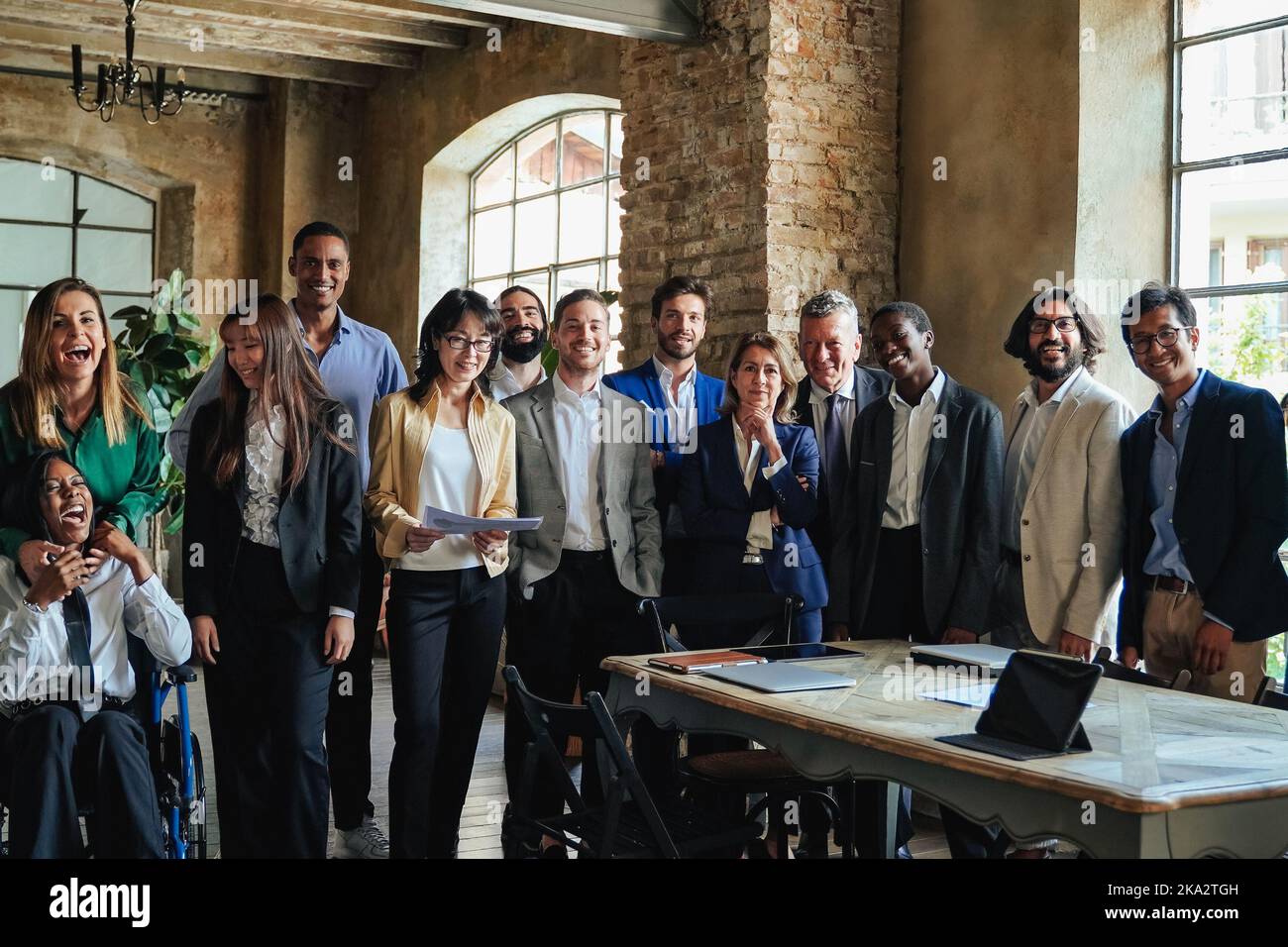 Happy multiracial business people working inside bank office - Focus on ...